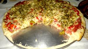 Calorias em 1 Porçoes Pizza A Moda Da Casa e Fatos Nutricionais?